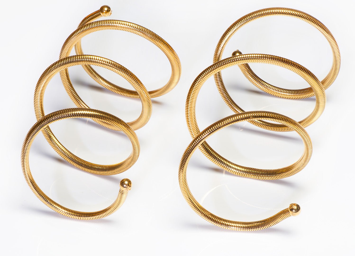 Chanel Paris 1997 Gold Plated CC Pair Arm Coil Wrap Bracelets