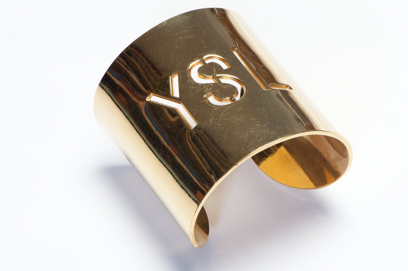 Vintage Yves Saint Laurent Paris YSL Wide Gold Plated Logo Cuff Bracelet